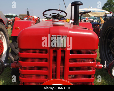 The Red McCormick International Farmall D-320 is a tractor model widely ...