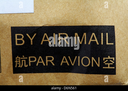 by air mail par avion on package parcel Stock Photo - Alamy