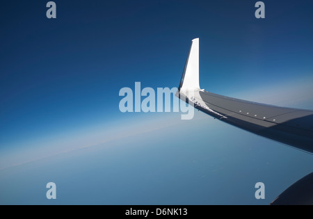 winglet on a boeing 737-800 westjet aircraft flying over Canada. The ...