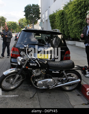 Keanu Reeves' 1973 Norton Commando 750 motorcycyle A woman parking on ...