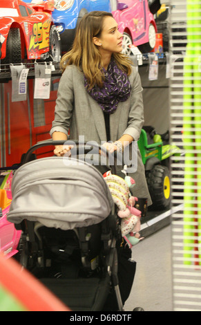 Jessica Alba shopping at Toys R US pushing her new baby daughter in a ...
