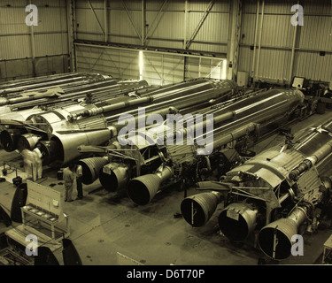 This image shows the assembly process of the Atlas rocket at a factory ...