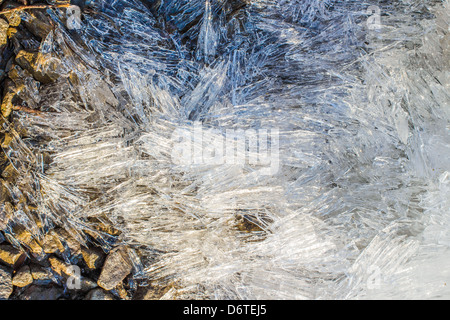 Abstract shapes of ice crystals. Needle-like crystals of ice in the ...