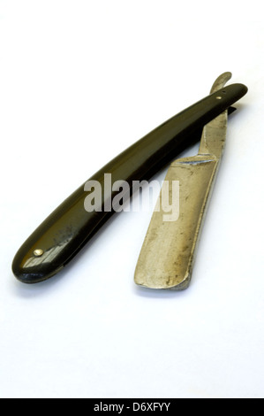 antique old cut throat or straight razor on a white background Stock ...