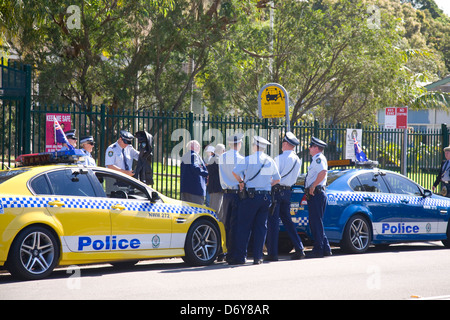 Sydney police officers in a Holden Commodore patrol car in Avalon ...