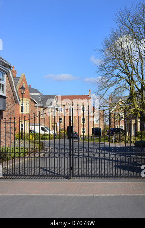 A blue gate of a very nice house Stock Photo - Alamy