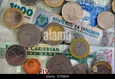 Caribbean money; East Caribbean currency; notes and coins and a shell ...