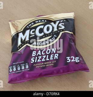 Packet of McCoy's Bacon Flavour Ridge Cut Crisps Stock Photo - Alamy
