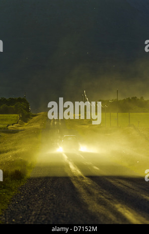 Canada, Alberta, Vehicle creating dust on country road Stock Photo - Alamy