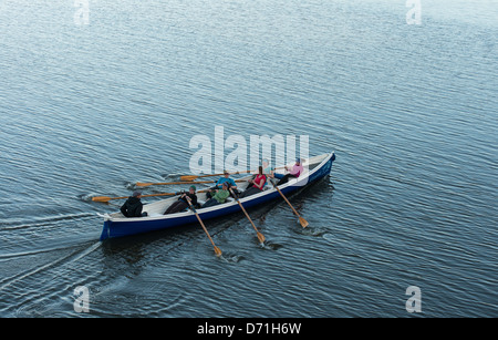 Appledore, North Devon, England. A rowing team is embarking from ...