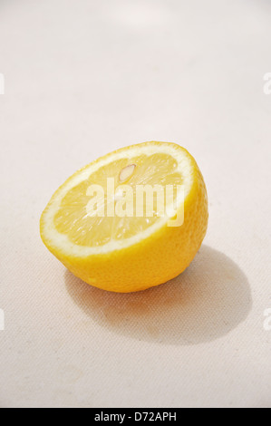 A lemon sliced in half Stock Photo - Alamy