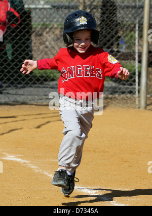 Child running to a base Stock Photo - Alamy