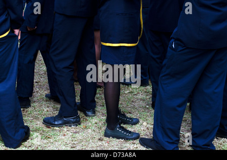 Cheerful female students wearing blue school uniforms walking in Stock ...