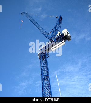 Blue crane with a funny sign Stock Photo - Alamy