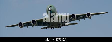 An unpainted Airbus A380 aircraft arrives at the Airbus production ...