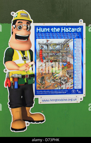 Hunt the Hazard cartoon poster at construction site Molesey, Surrey ...