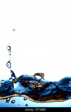 A vertical shot of water drops on a green leaf Stock Photo - Alamy