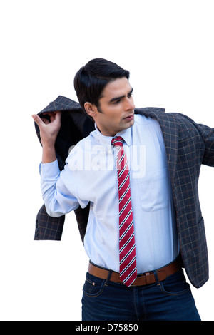 Handsome young indian businessman getting ready wearing suit isolated ...