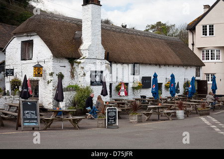 the ship inn in Porlock weir Somerset with people sat on seats at ...