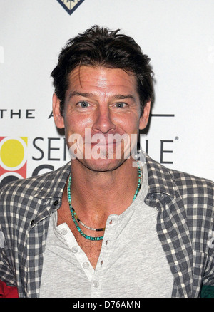 Ty Pennington, at the 'Move That Bus' to celebrate the grand opening of ...