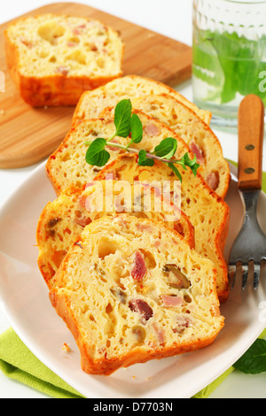 Slices of savory ham and olive cake Stock Photo - Alamy