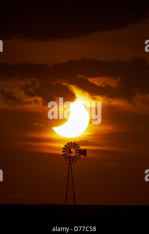 Windmill Silhouetted by Solar Eclipse Stock Photo - Alamy