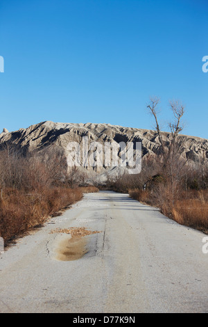 Empty deserted road leading to chat pile toxic by-product underground ...
