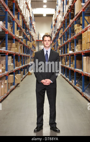 Portrait Of Male Manager In Logistics Distribution Warehouse Stock ...
