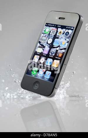 An Iphone with water damage Stock Photo - Alamy