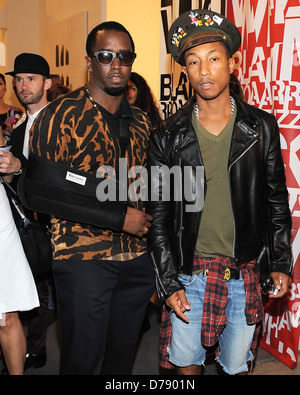 P. Diddy and Pharrell Williams attending the Art Basel Miami 2011 held ...