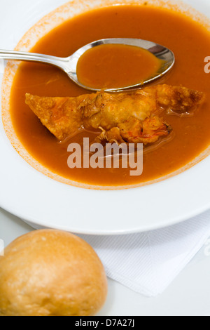 Crab soup with mango ravioli Stock Photo - Alamy