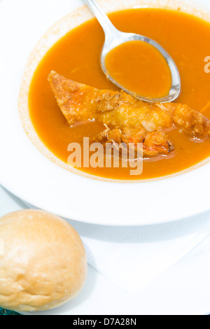 Crab soup with mango ravioli Stock Photo - Alamy