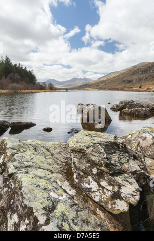 Looking across Capel Curig lake to Mount Snowdon early on a winter ...
