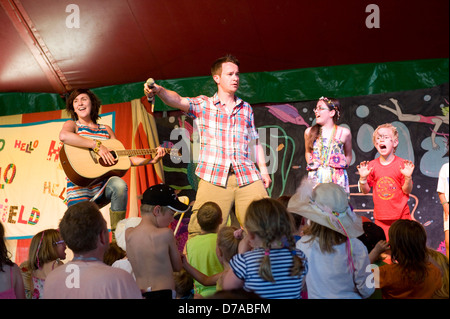 Cbeebies presenters performing in the main tent of the kids field at ...