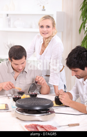 Raclette (traditional melted cheese dish) stall at Christmas market in ...