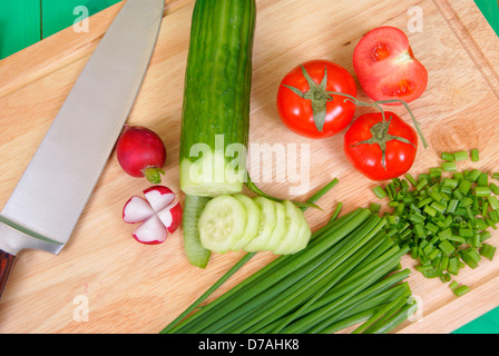 variable types of vegetables on salad on background Stock Photo - Alamy