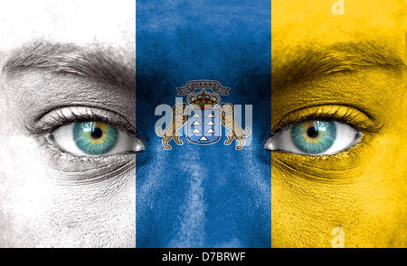 Human face painted with flag of Canary Islands Stock Photo - Alamy