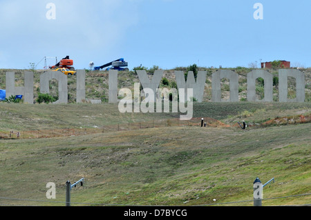 Atmosphere A replica of the famous 'Hollywood' sign appears on top of a ...