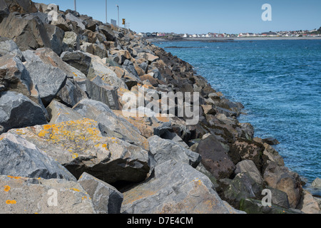 Rock armour sea defenses in St Peter Port, Guernsey Stock Photo ...
