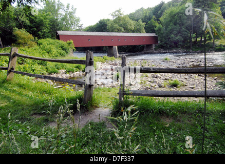 West Cornwall covered bridge over rapids in the Housatonic River, with ...