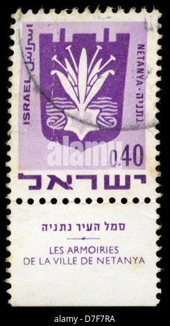A stamp from Israel depicting official symbol city Ashdod. Ashdod ...