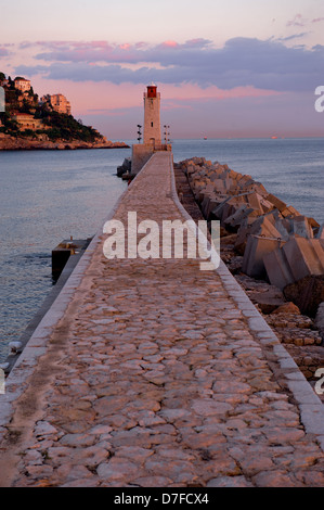 The lighthouse at the Port of Nice on the Mediterranean Sea at Nice ...