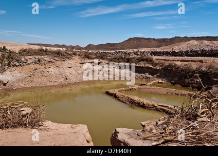 Hafir - a reservoir used to catch rainwater, near Naqa, northern Sudan ...