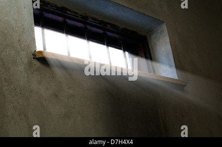 Light is coming through the barred window, hope concept Stock Photo - Alamy