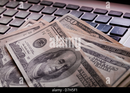 Computer keyboard and money Stock Photo - Alamy