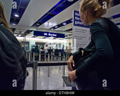 UK Border passport control queue at Glasgow Airport - immigration and ...