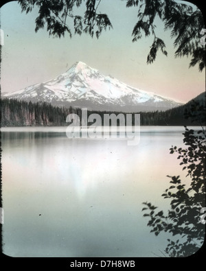 This image captures the serene reflection of Mount St. Helens in Spirit ...