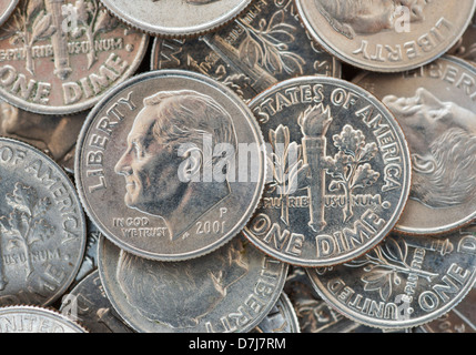 Close up shot of shiny coins separated in a special container Stock ...