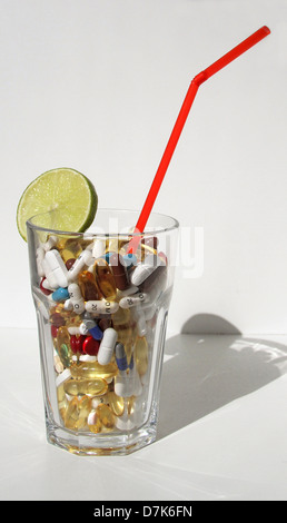 Cocktail of tablets Stock Photo - Alamy