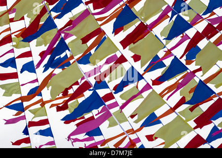 Cone of colorful flags fixed to ropes, isolated Stock Photo - Alamy